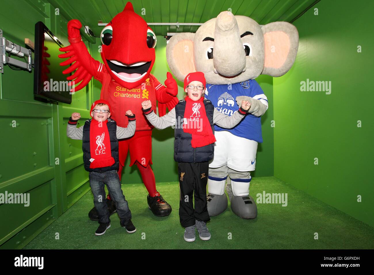 Liverpool mascot Might Red and Everton mascot Changy (right) pose with ...