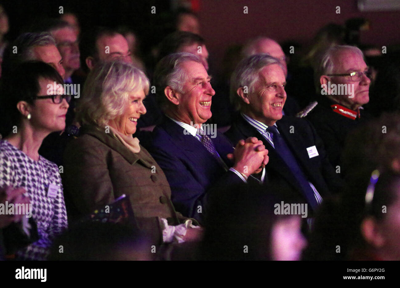 The Prince of Wales and The Duchess of Cornwall laugh as they watch a ...