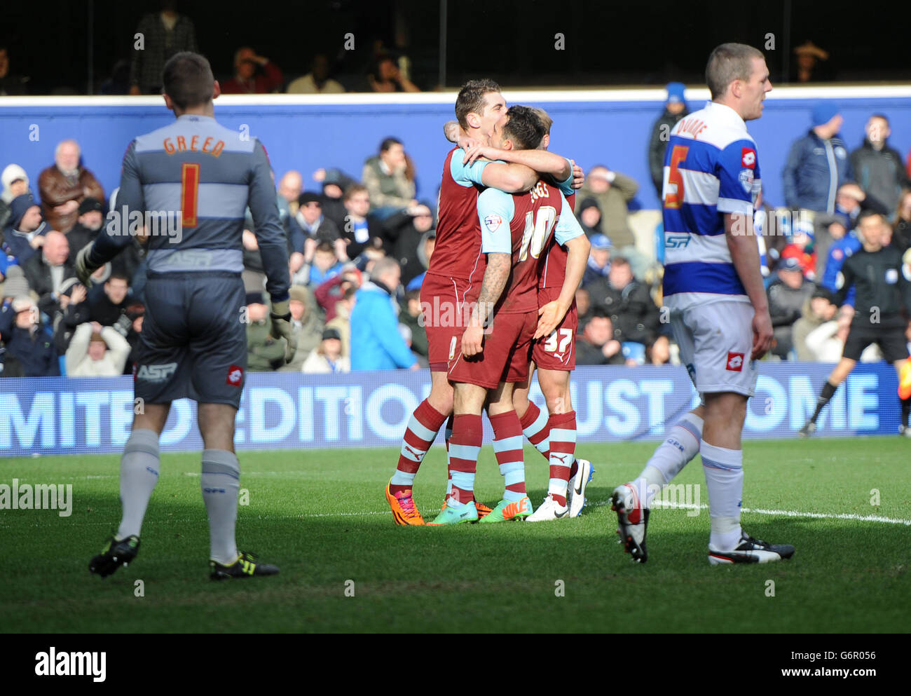 Burnley's Sam Vokes celebrates scoring their third goal with team mates ...