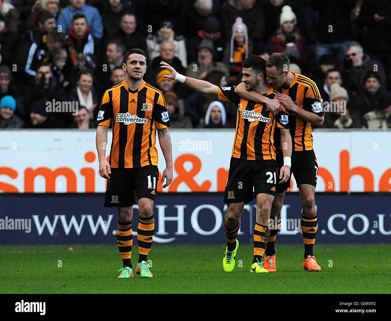 Hull City's Shane Long (centre) celebrates scoring his sides first goal ...