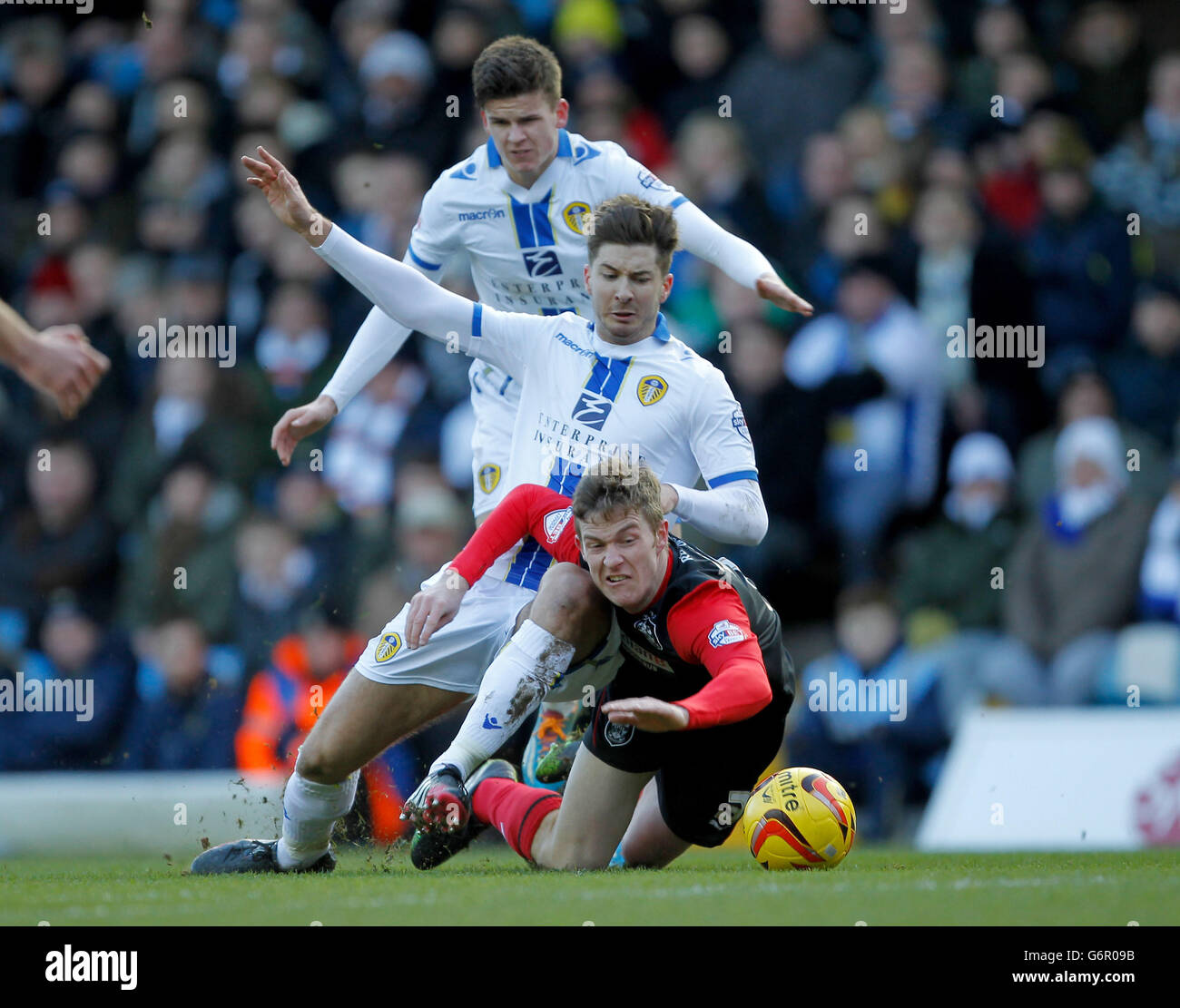 Leeds United's Luke Murphy (left) and Huddersfield's Paul Dixon battle ...