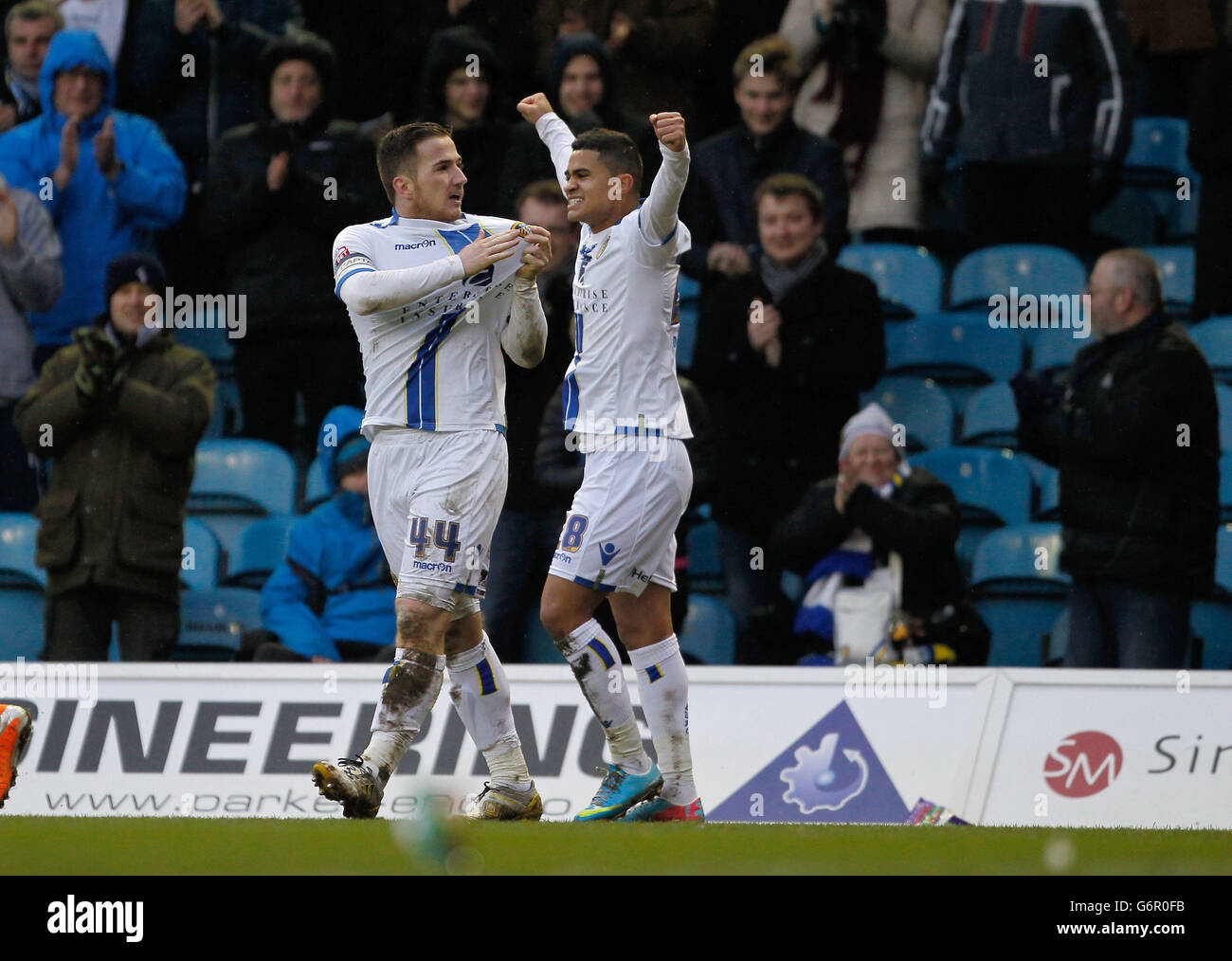 Leeds United's Ross Mccormack (left) celebrates scoring his sides third ...