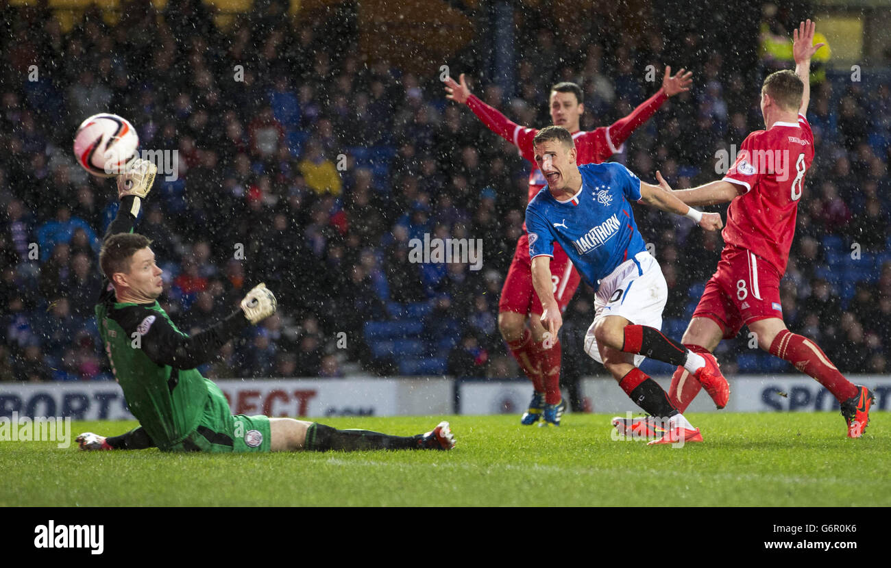 Rangers Dean Shiels (centre) puts his shot wide during the Scottish ...