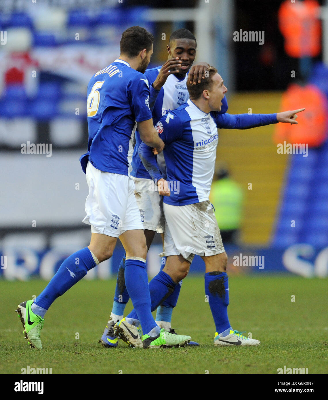 Birmingham City's Brian Howard (right) celebrates with team-mates Aaron ...
