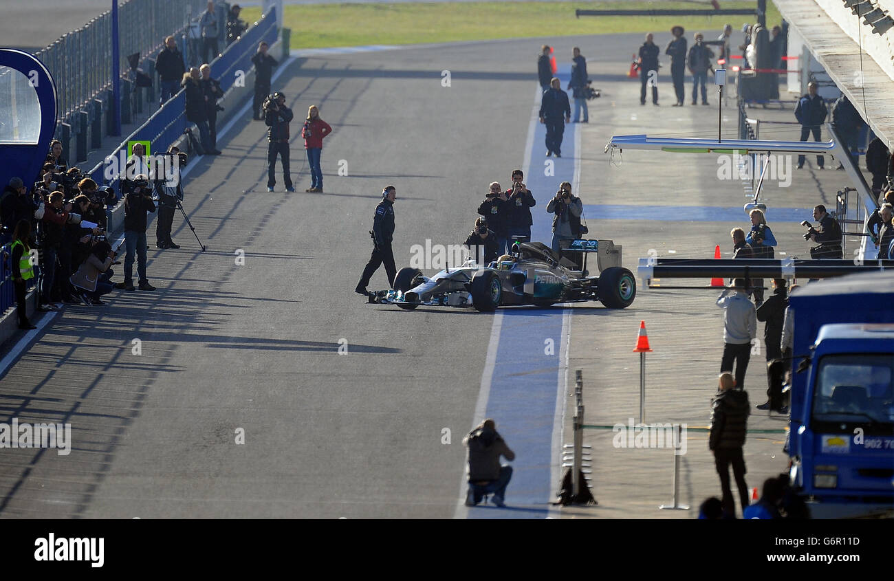 Mercedes driver lewis hamilton leaves the team garage hi-res stock ...