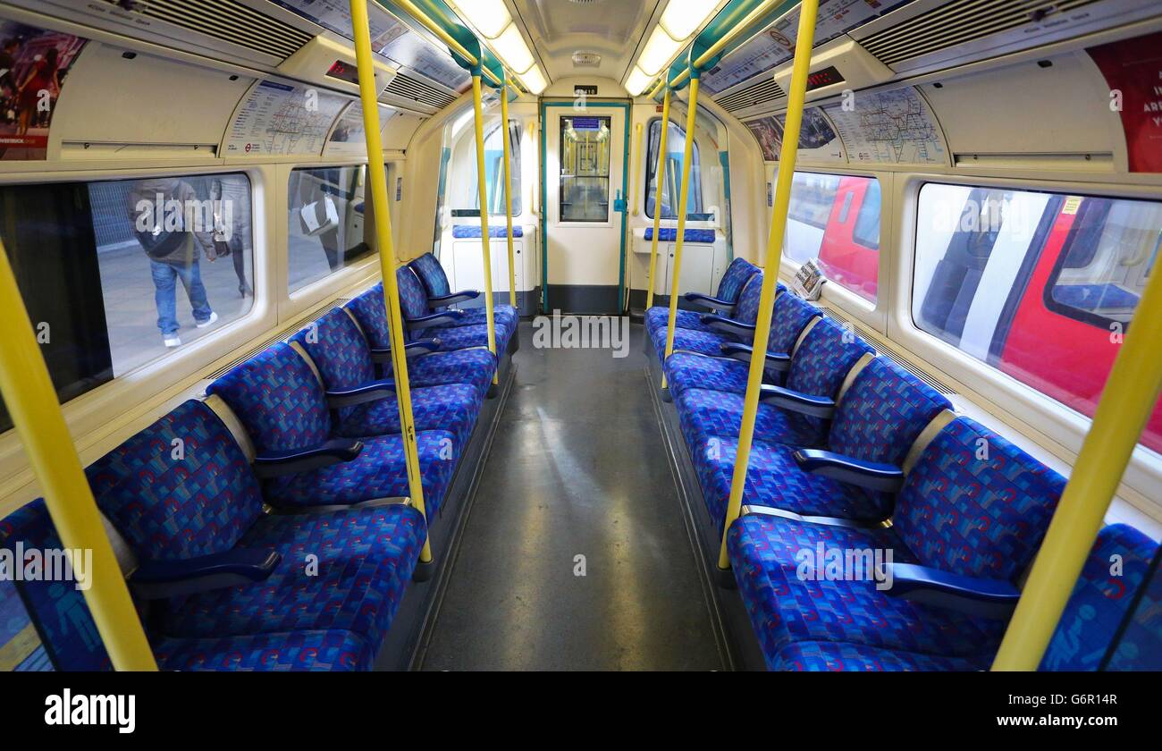 Empty passenger seats on a tube train in London as commuters face a 48 ...