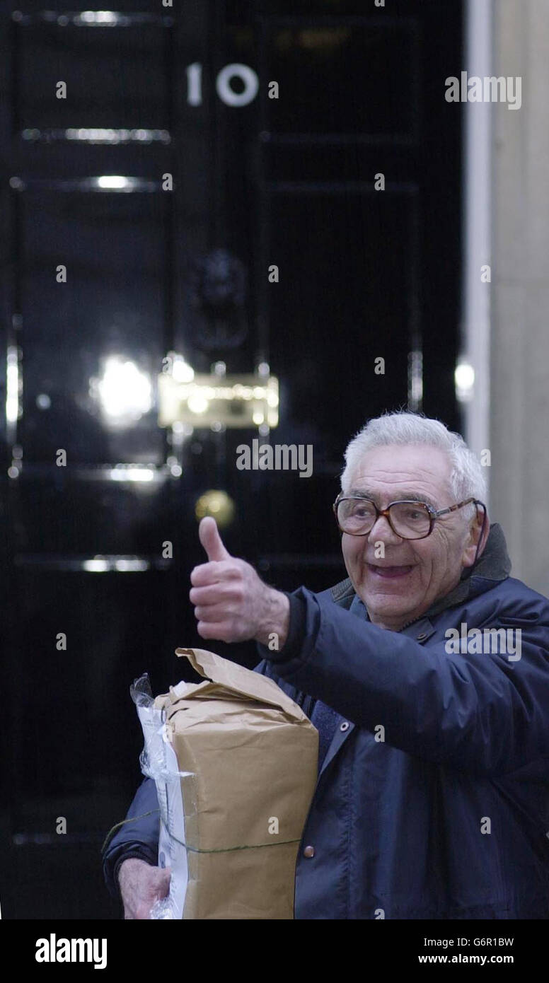 Kevin Brooks, from Uxbridge, helps to hand in a petition to No 10 ...