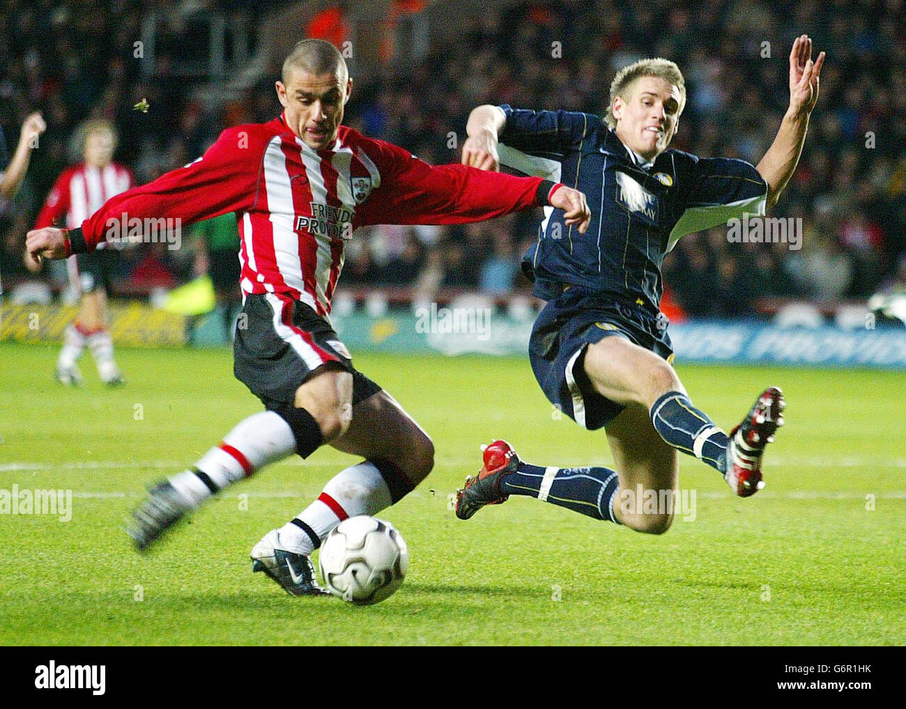 Leeds United defender Matthew Kilgallon (right) tackles Southampton's ...