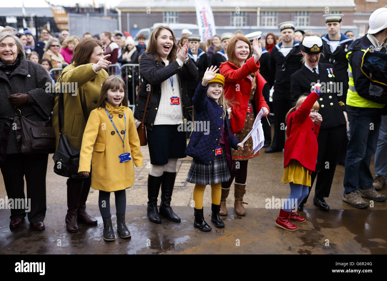 The family of Captain Utley, the commanding officer, spot their father ...