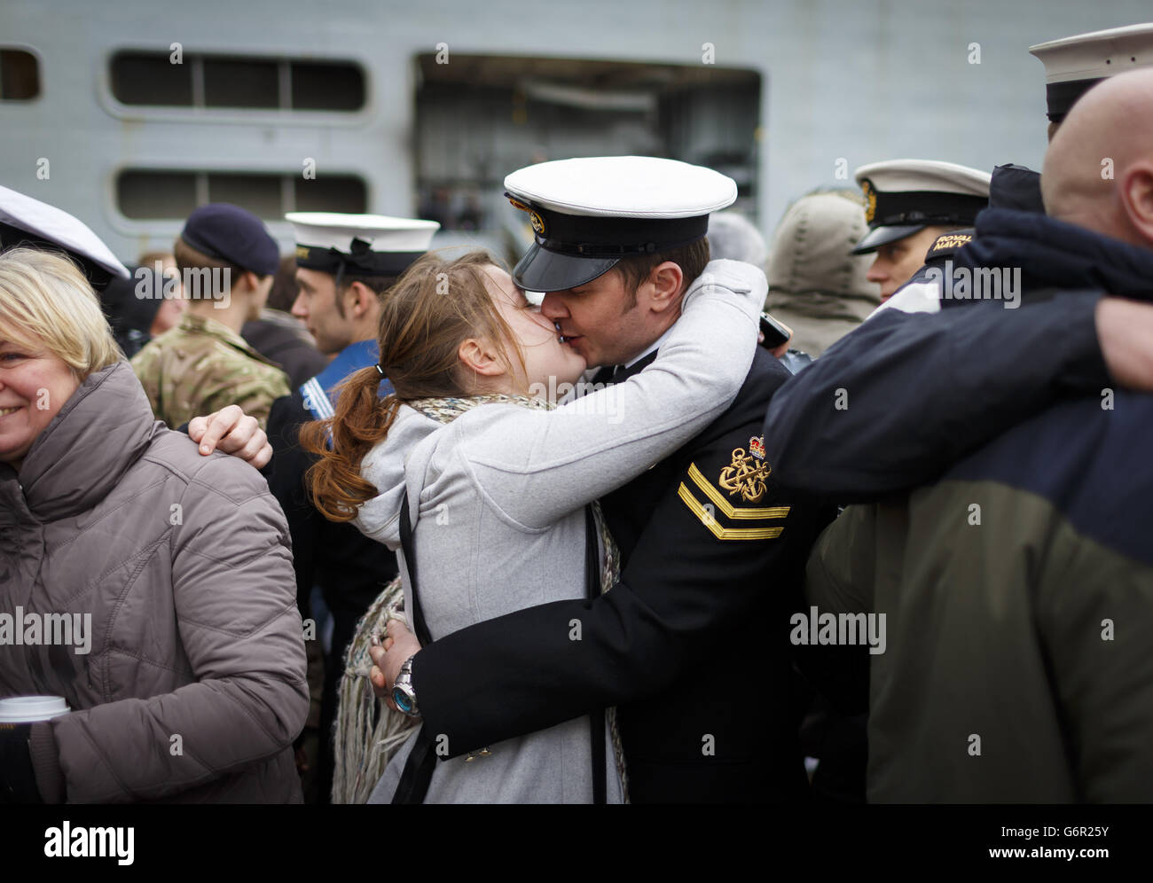 A couple kiss on the jetty after the junior officer disembarked HMS ...
