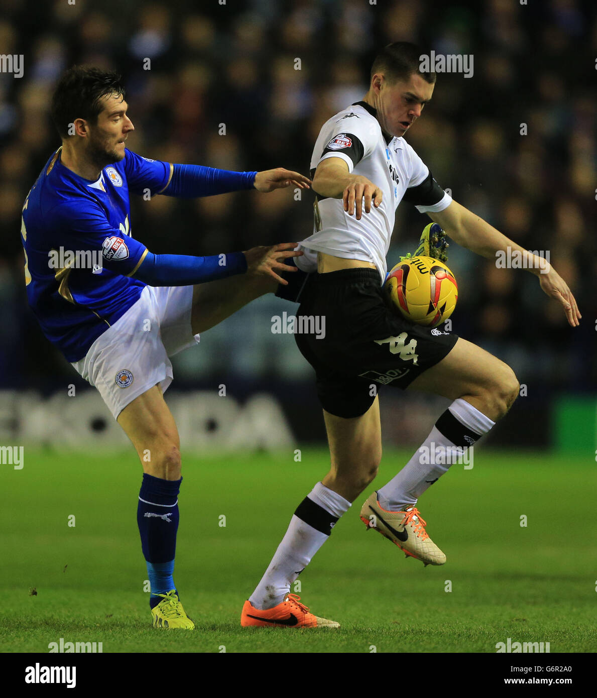 Derby County's Michael Keane (right) controls ball away from Leicester ...
