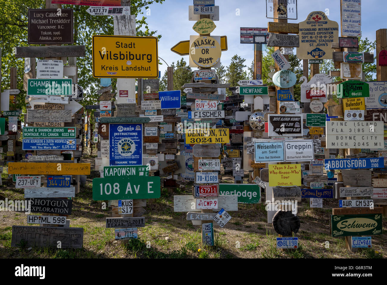 Sign post forest in Watson Lake, Yukon Stock Photo - Alamy