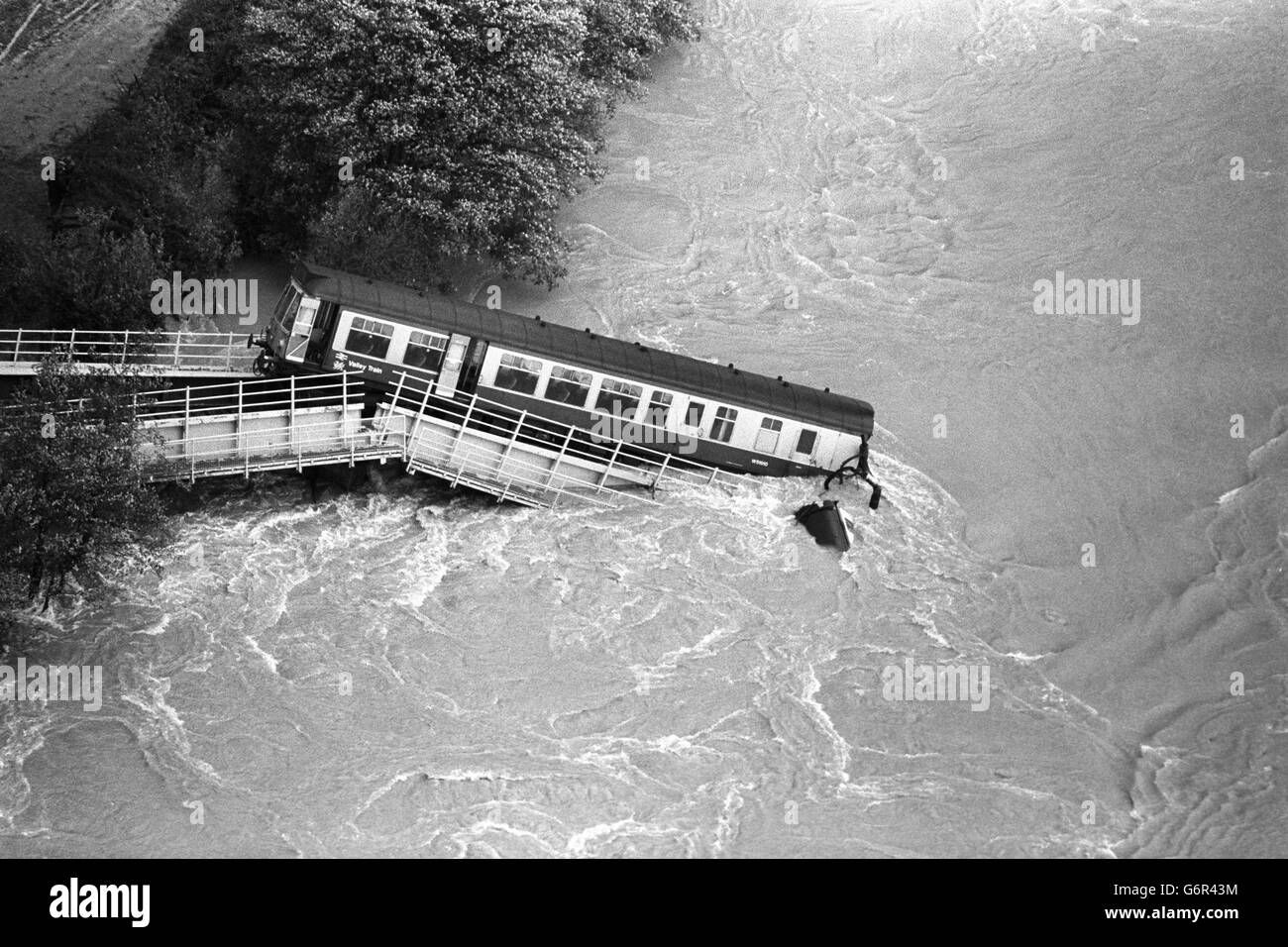 Aerial view of the train on the remains of a bridge over the River Towy ...