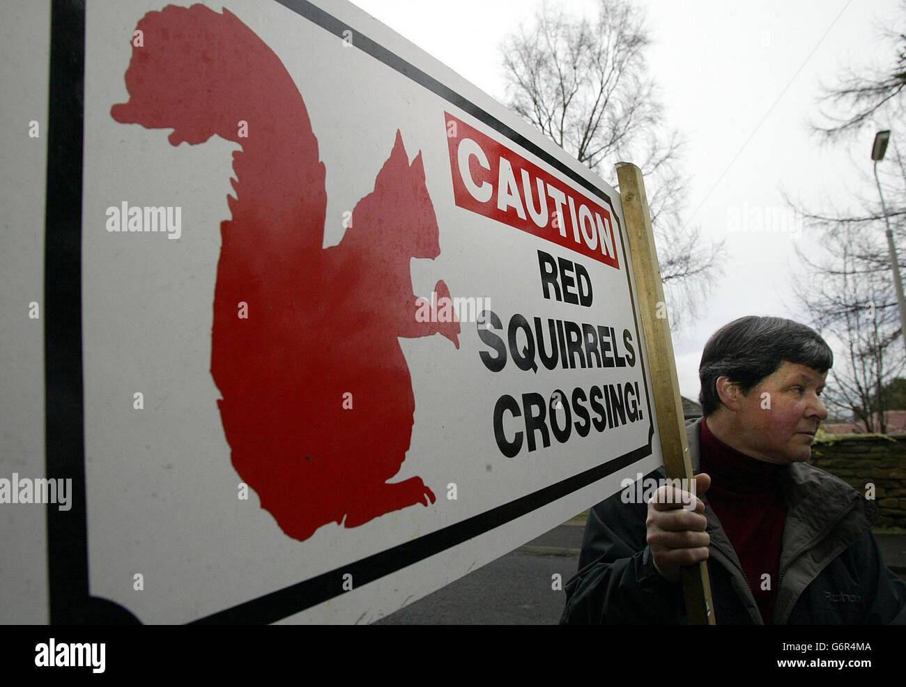 Wildlife lover Penny Hewitt, 50, with one of her hand made road signs ...