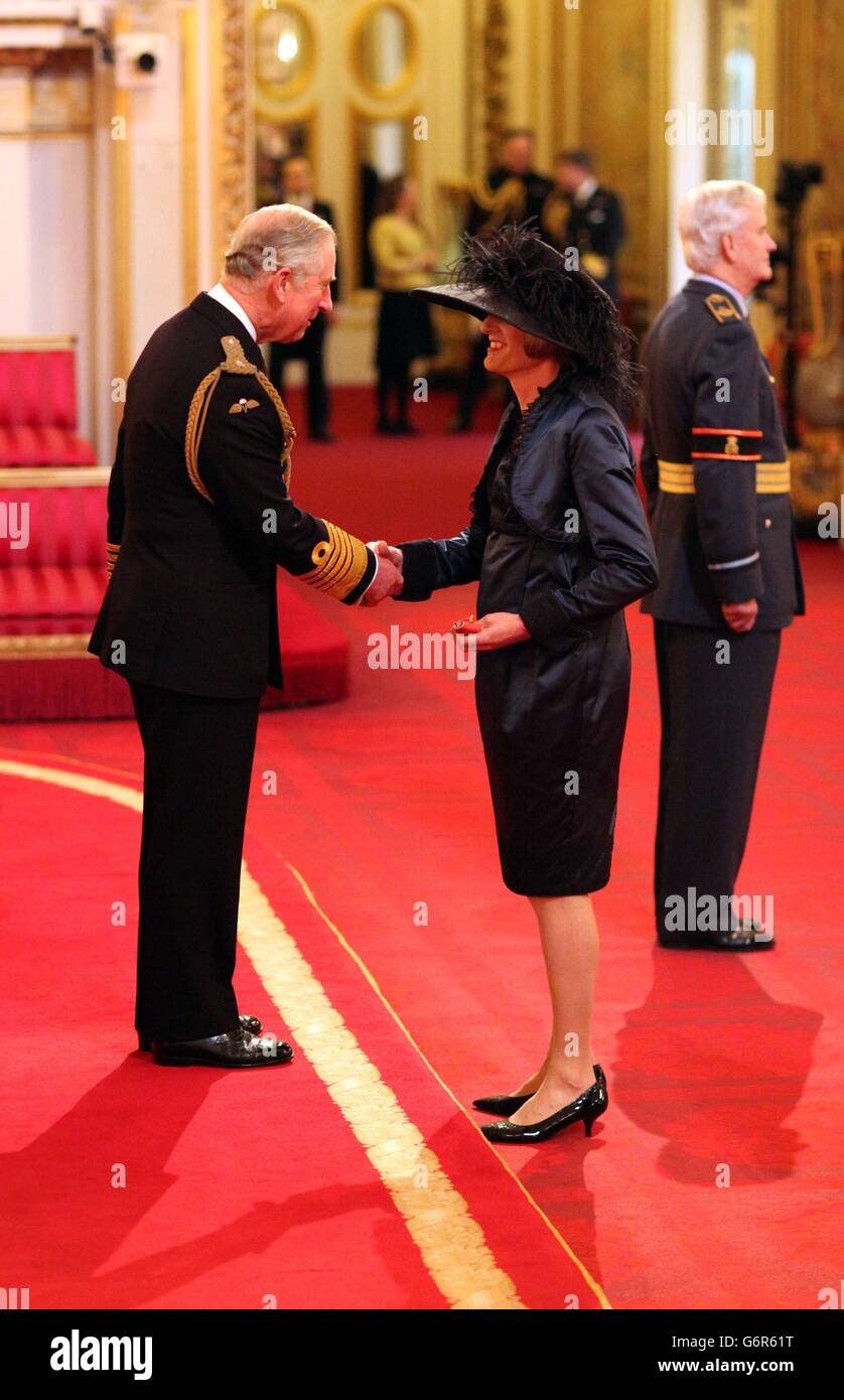 Artist Grayson Perry is made a CBE by the Prince of Wales during an ...