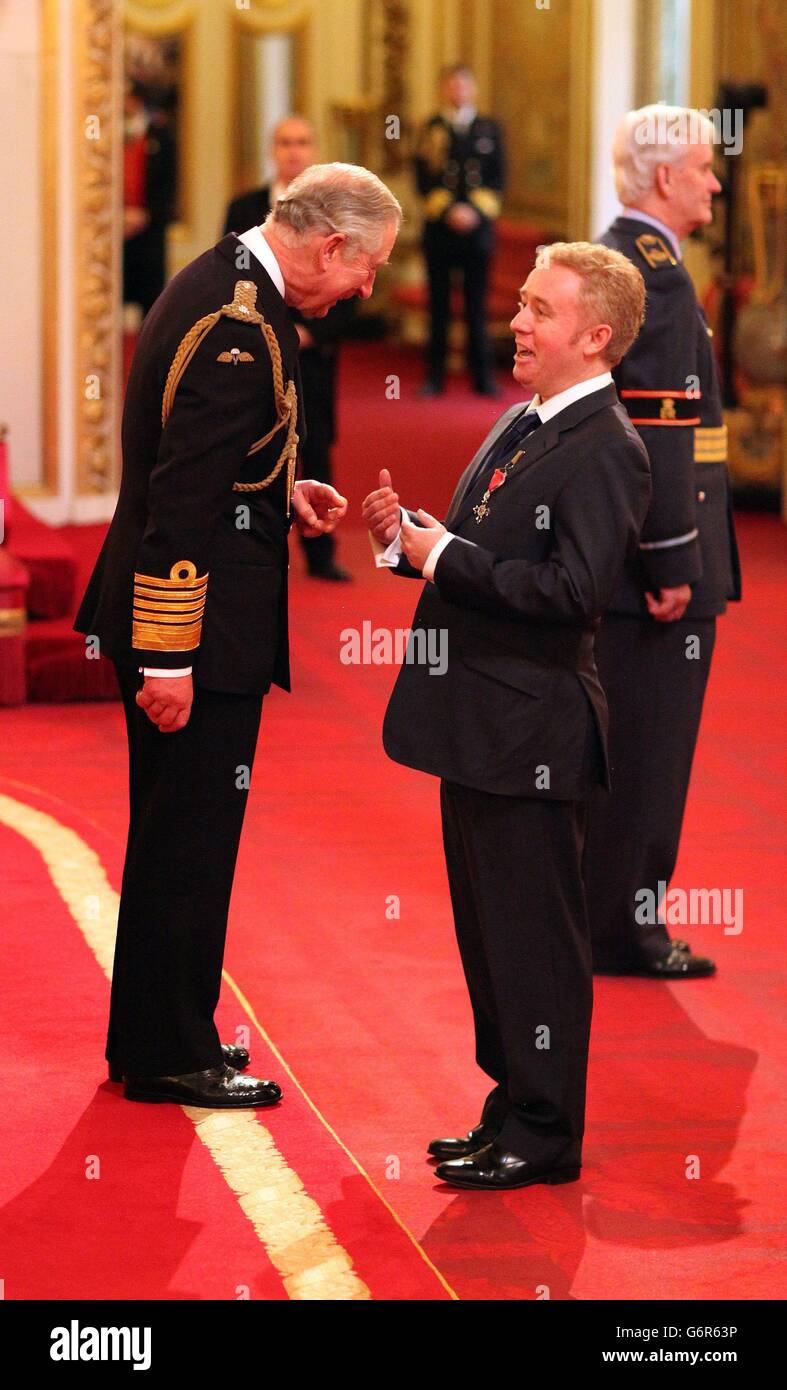 Mark millar made mbe prince wales investiture ceremony buckingham ...