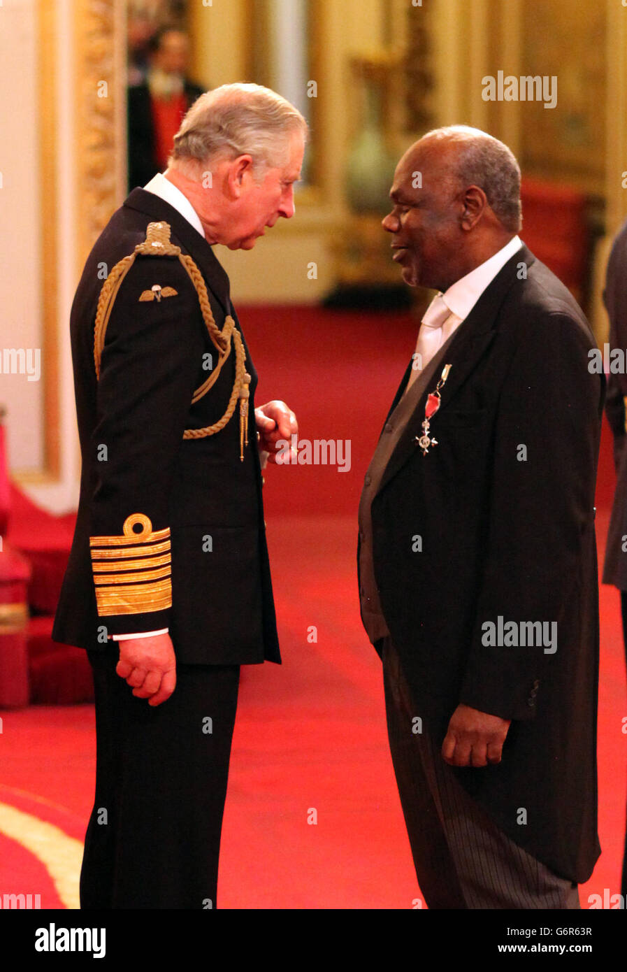 Lloyd newby made mbe prince wales investiture ceremony buckingham ...