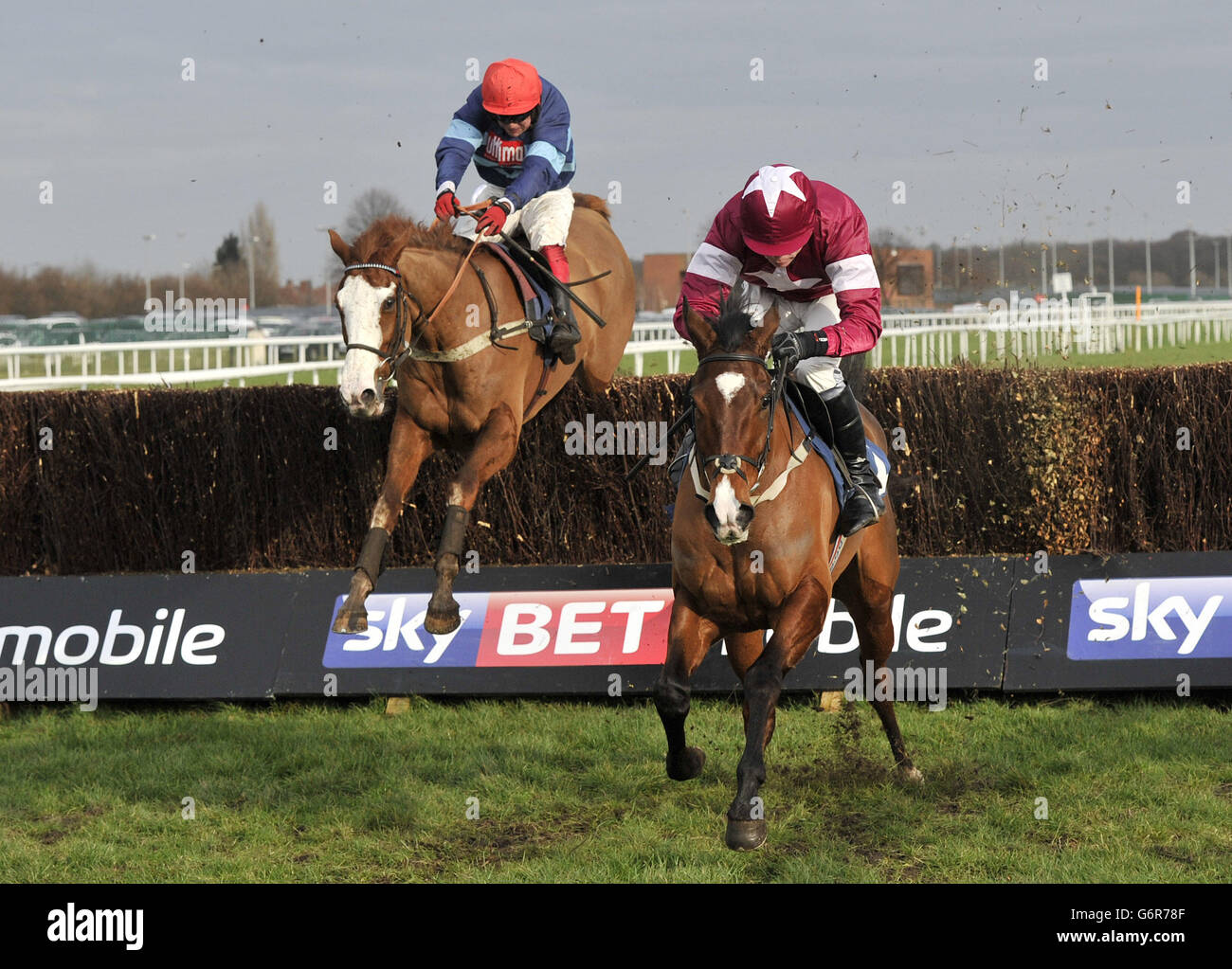 Valdez and Robert Thornton(left) jump the final fence behind Arnaud and ...