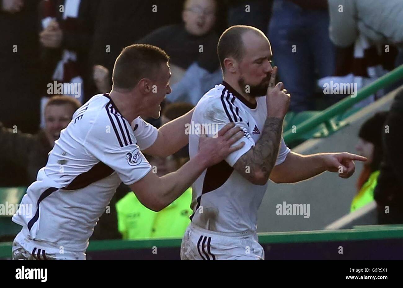 Hearts Jamie Hamill (right) celebrates scoring his sides second goal ...