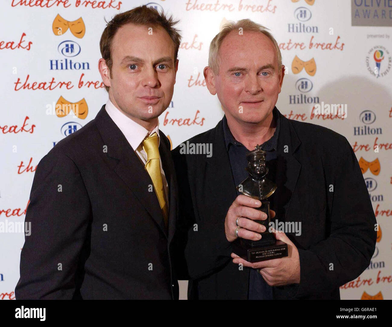 Celebrity award yellow tie jason donovan howard davies hi-res stock ...