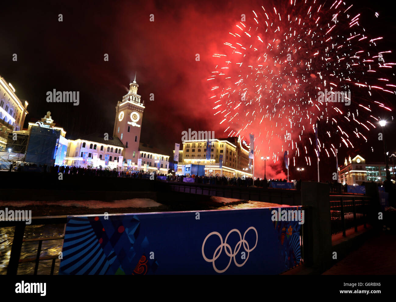 Crowds gather to watch the fireworks after watching the opening ...