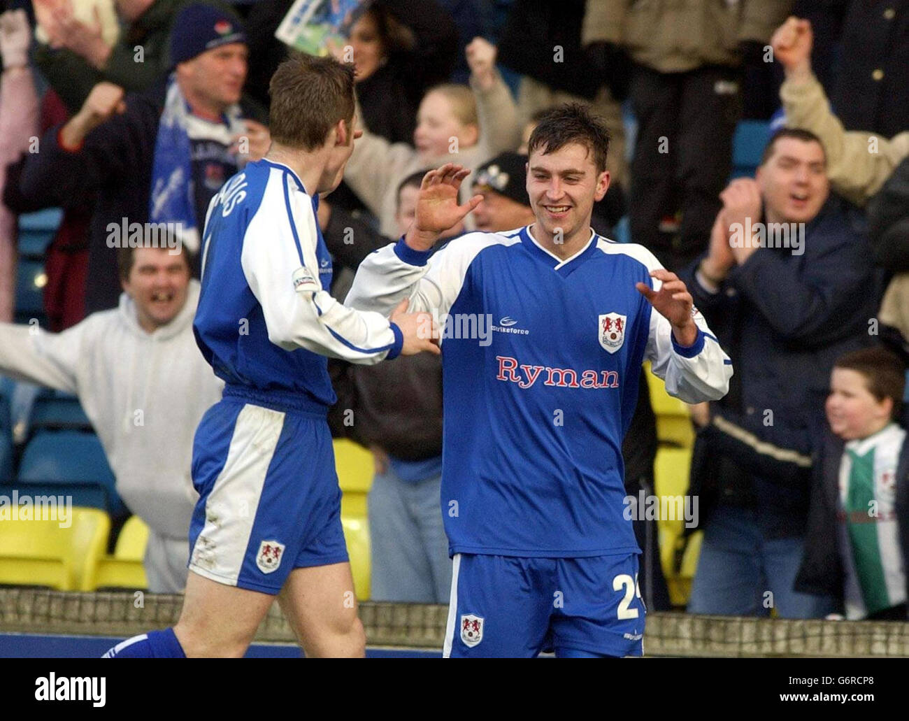 Millwall's Peter Sweeney (right) celebrates with team mate Neil Harris ...