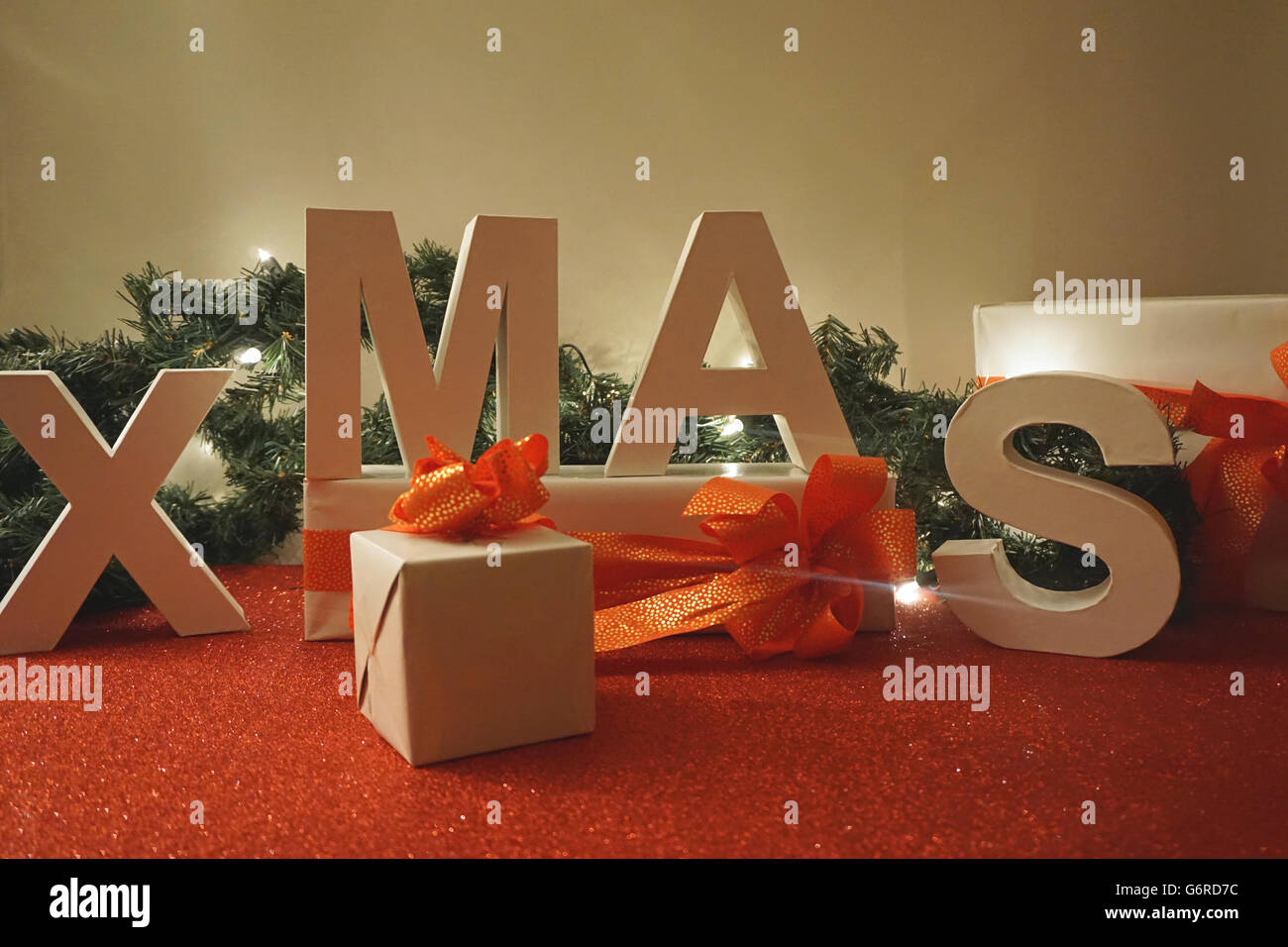 colorful xmas letters on red background for christmas Stock Photo - Alamy