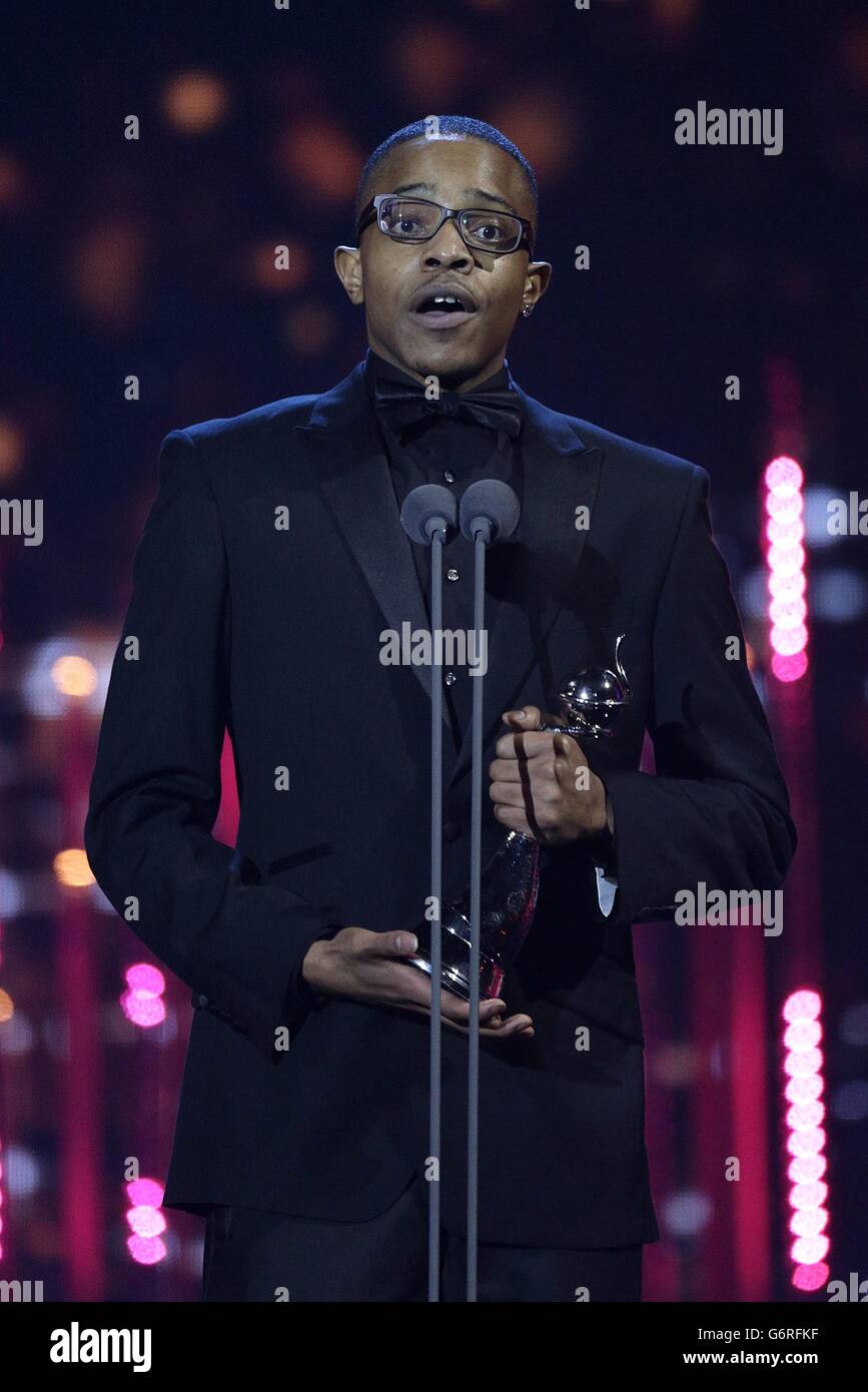 Khali Best accepts the award for Best Newcomer on stage during the 2014 ...