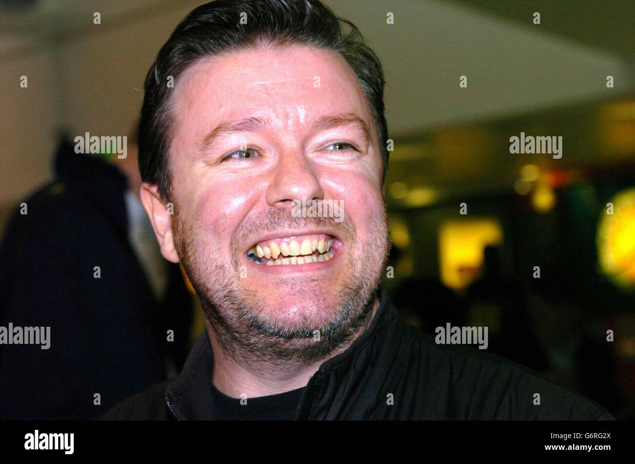 Comedian Ricky Gervais arrives at Heathrow from Los Angeles, after last ...