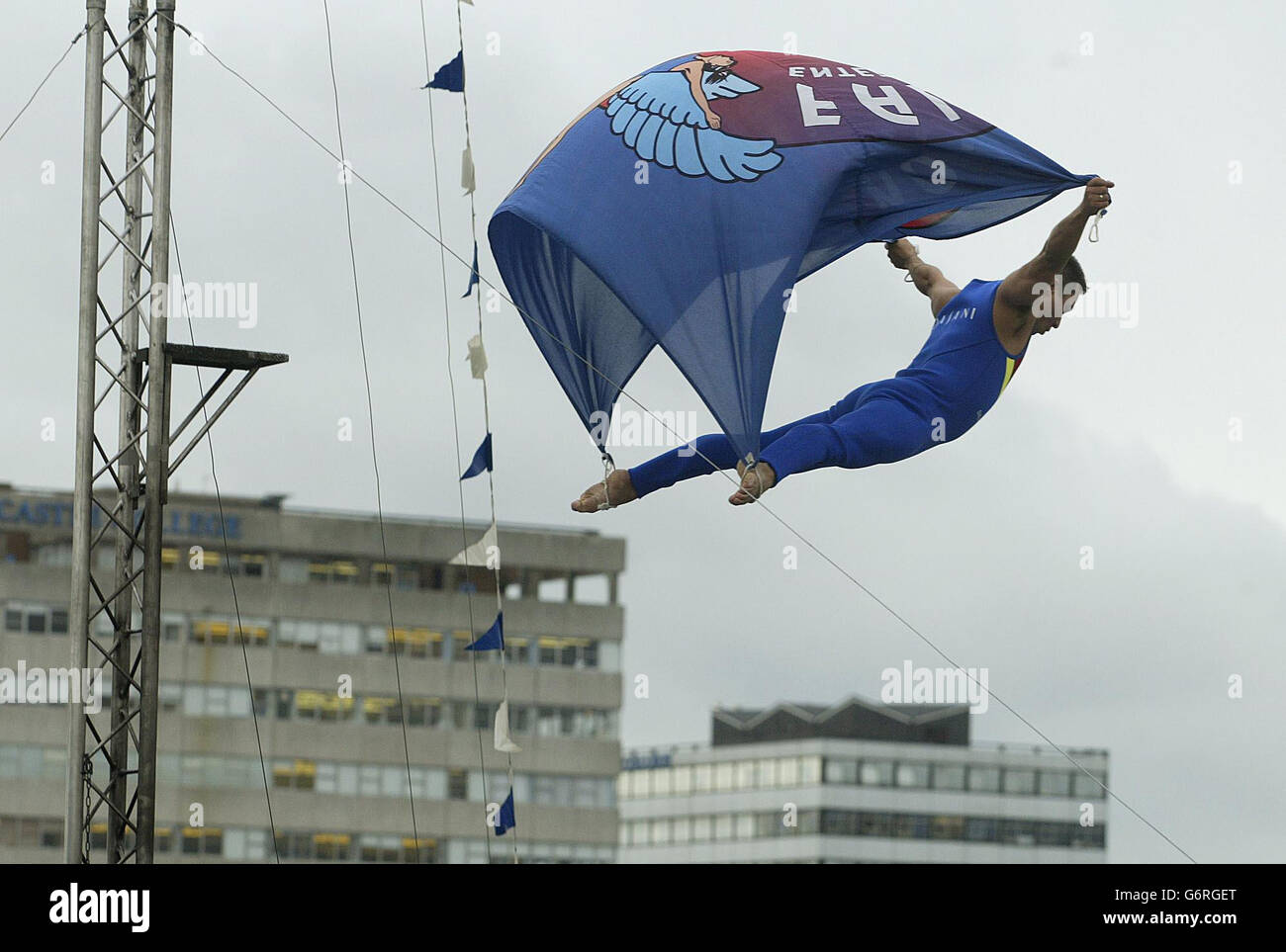 Mexican acrobat Raul Bustamante plunges from 90-feet high into a nine ...