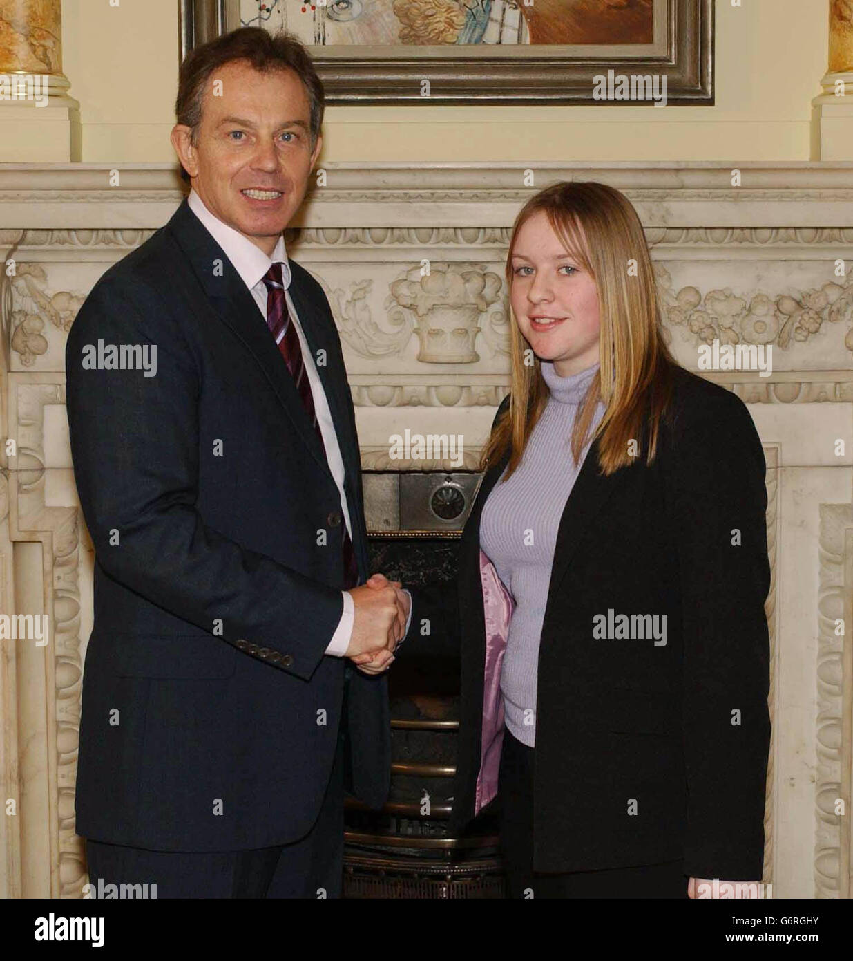 Britain's Prime Minister Tony Blair poses with Rachel Law, 15, from The ...