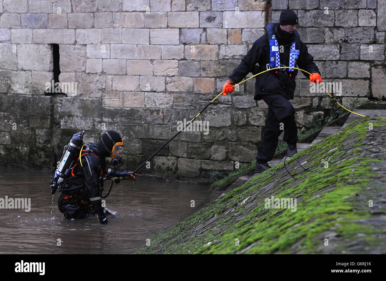 Police divers carry on their search of the River Ouse near Lendal ...