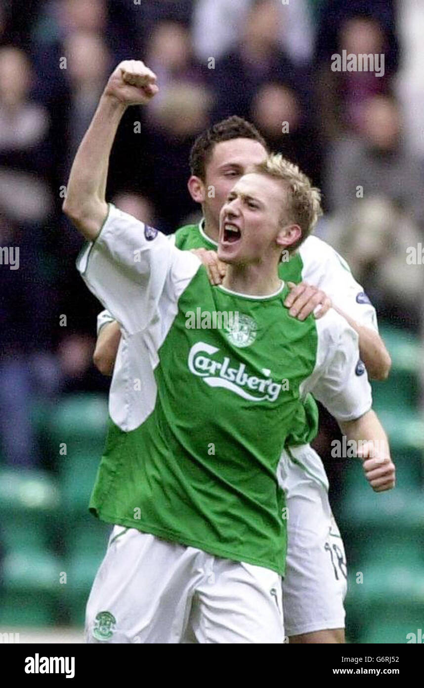 : Hibernian's Derek Riordan celebrates scoring against Hearts during ...