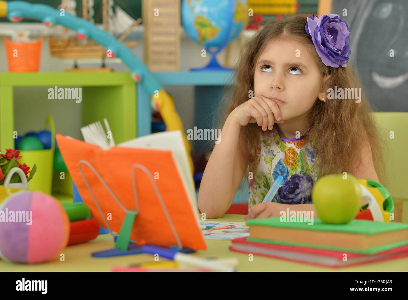 Cute student girl at class Stock Photo - Alamy