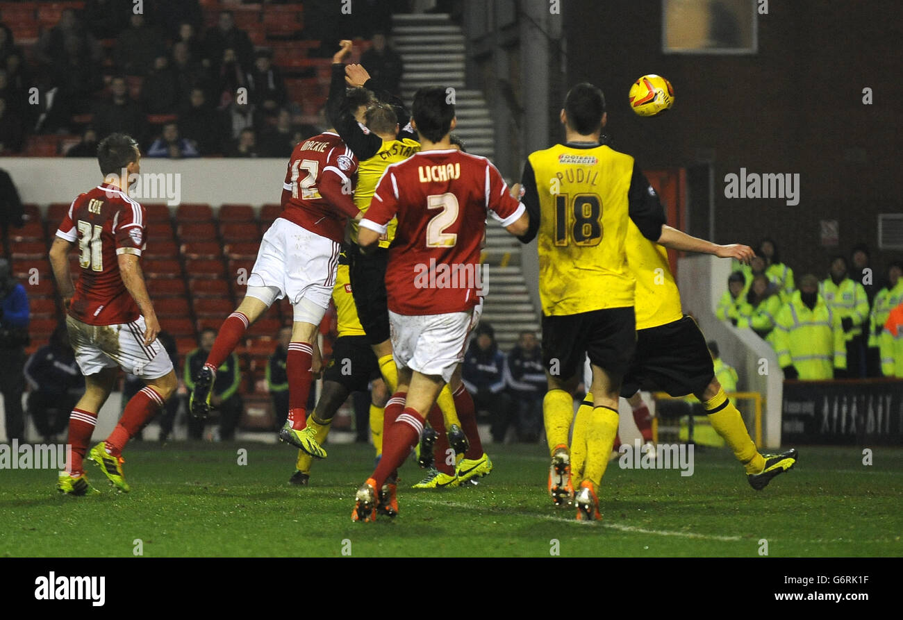 Nottingham Forest's Jamie Mackie (2nd left) scores his sides third goal ...