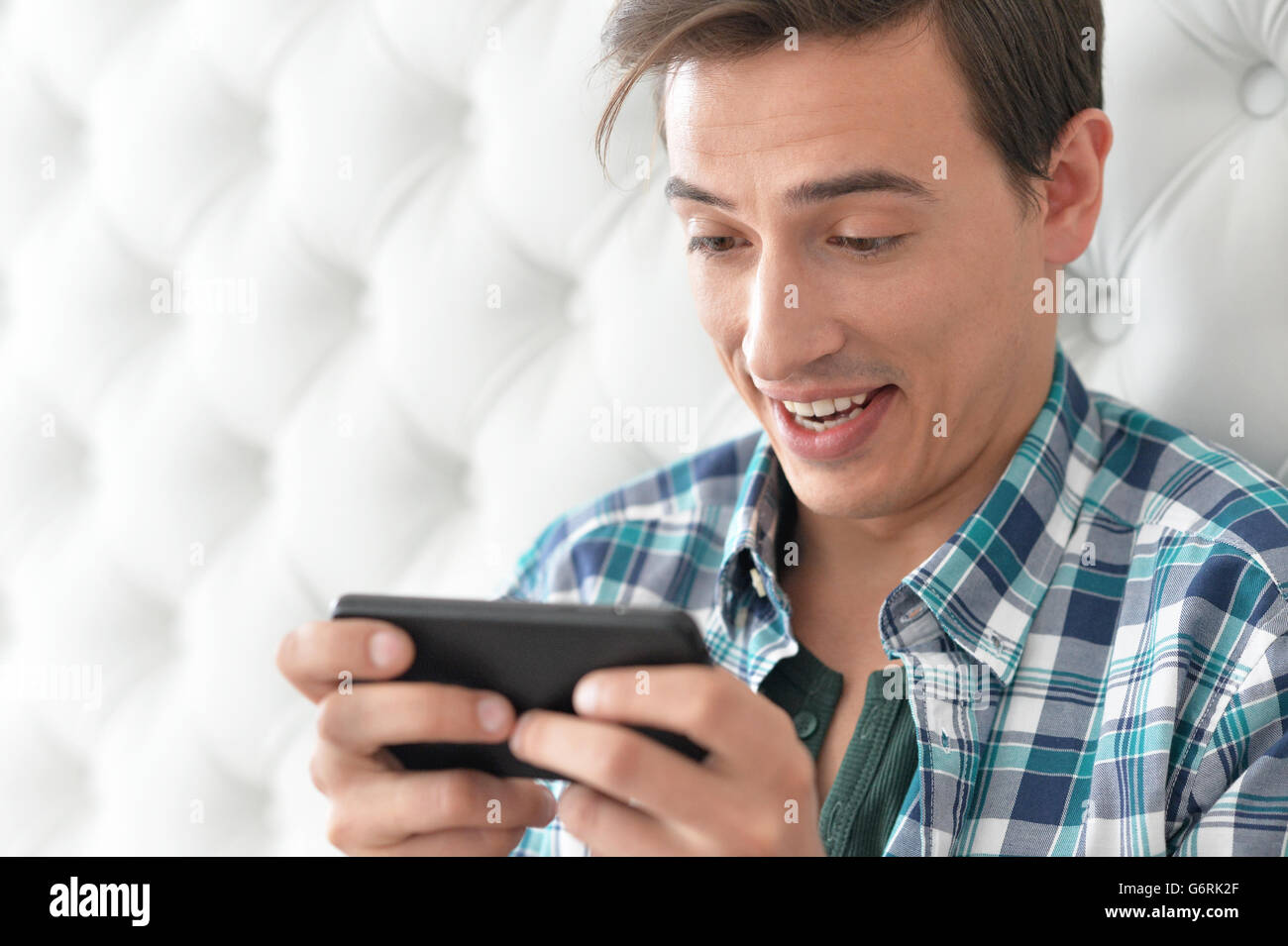 young man with phone Stock Photo - Alamy