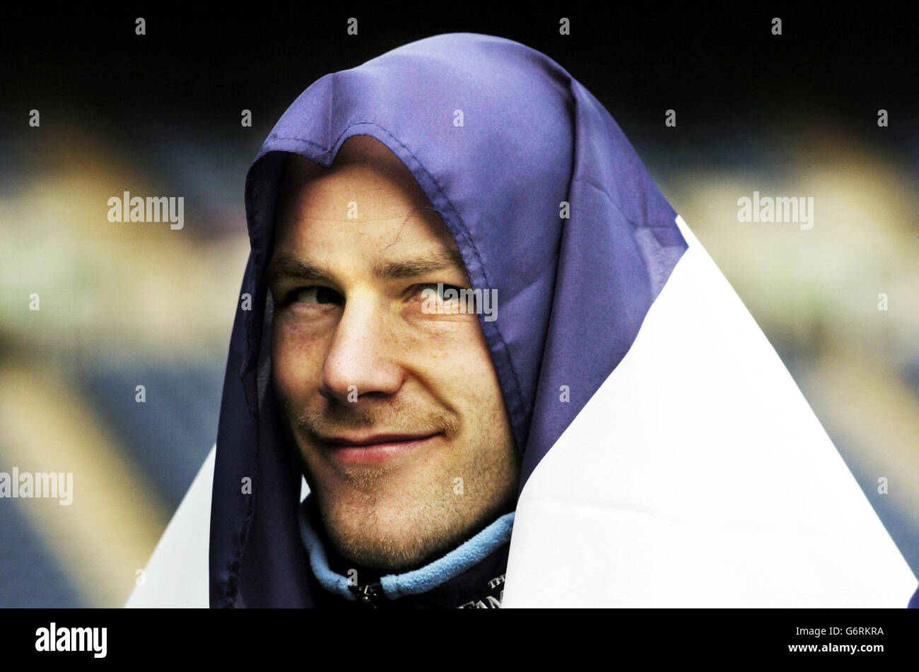 Edinburgh's Simon Webster draped in the St Andrew's flag before the ...