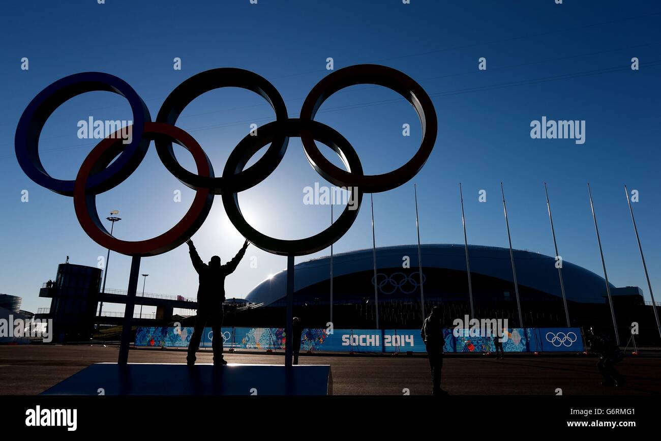 People have their picture taken by the Olympic Rings in the Olympic ...