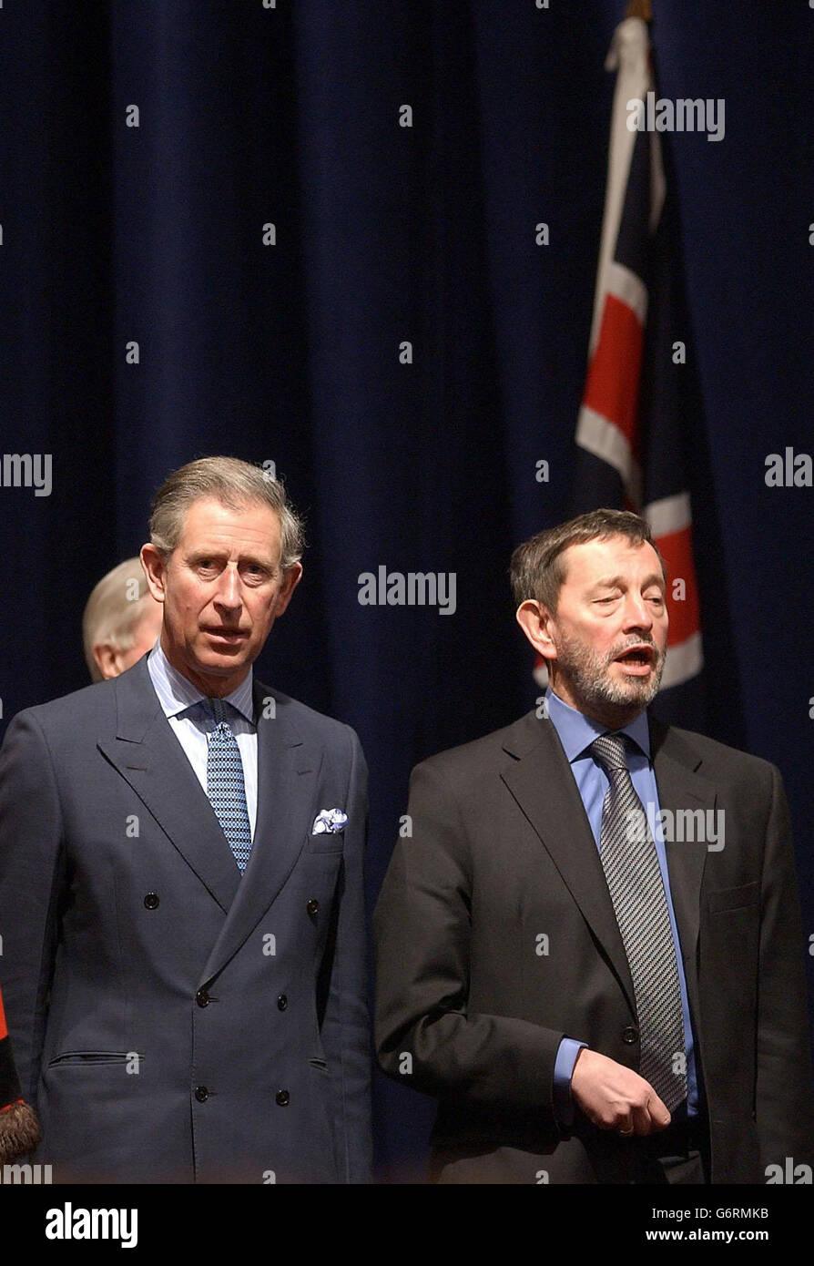 The Prince of Wales and Home Secretary, David Blunkett, sing the ...