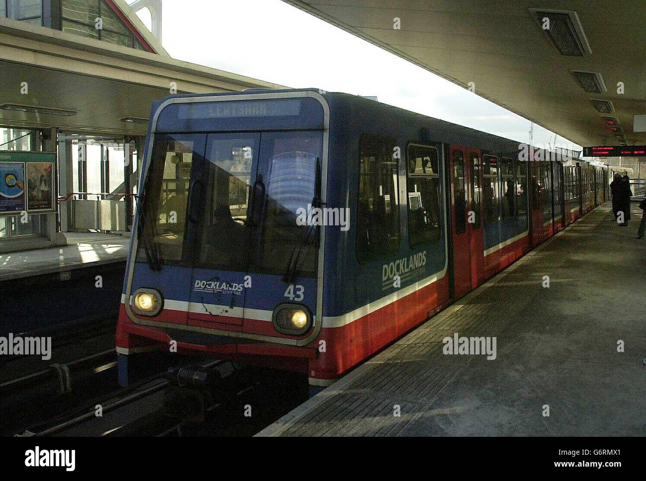 A train runs on the Docklands Light Railway Line in London, as plans ...