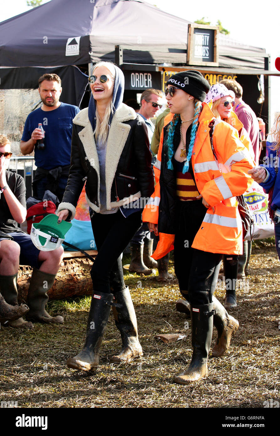 Poppy Delevingne and Suki Waterhouse are seen backstage at the ...