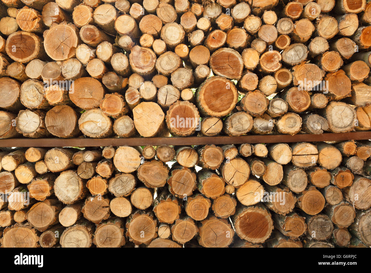 Stack of wood logs, wooden abstract background Stock Photo - Alamy