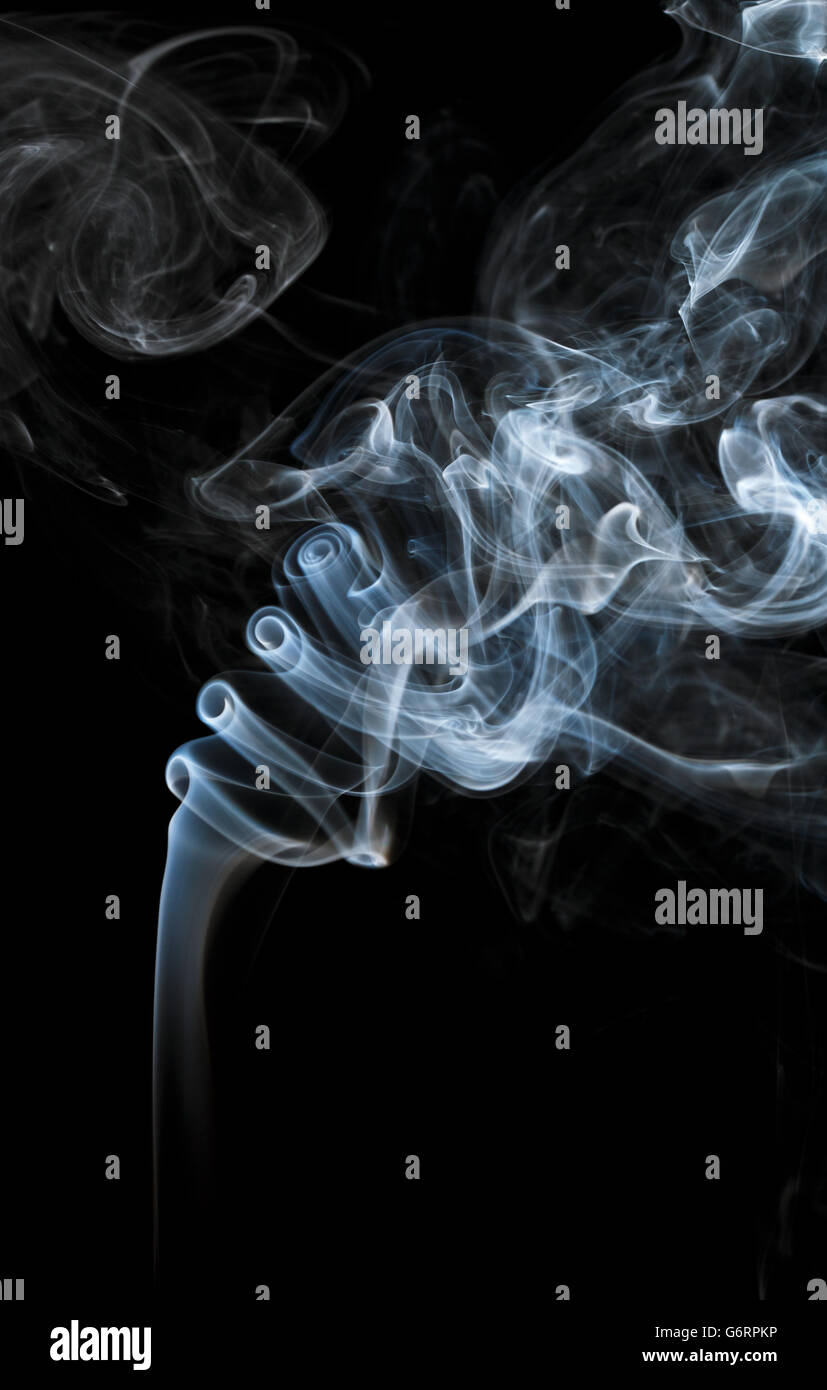 Abstract light smoke on a dark background Stock Photo - Alamy