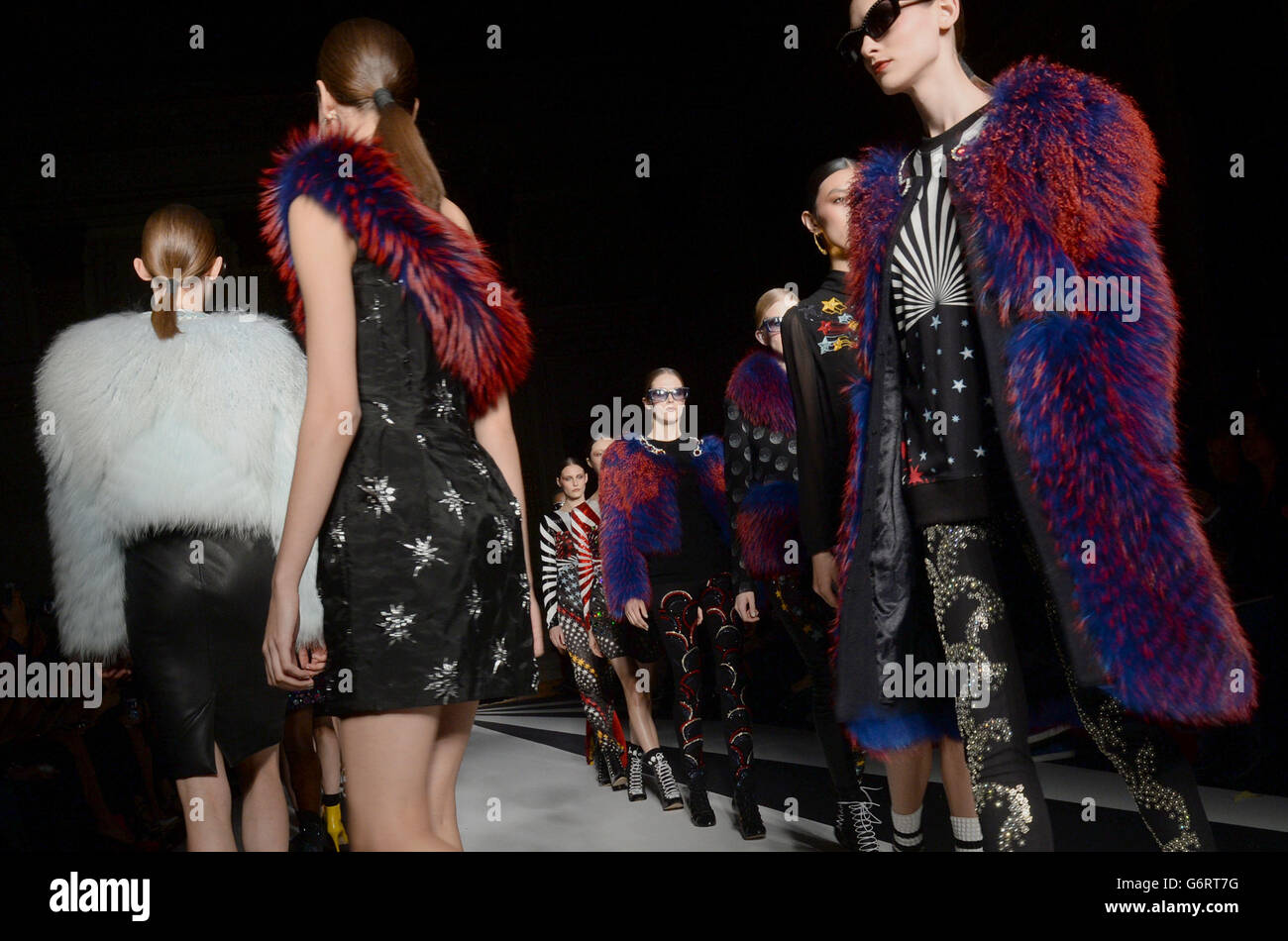 Models on the catwalk during the Matthew Williamson Autumn/Winter 2014 ...