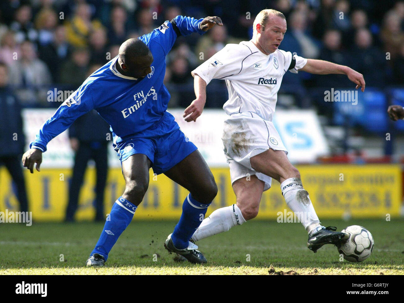 Chelsea's Jimmy Floyd Hasselbank (L) challenges Bolton's Simon Charlton ...