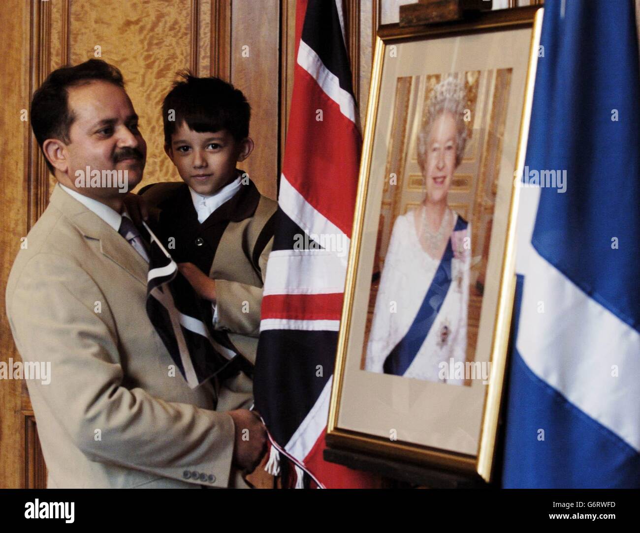 Muhammad Massood, with his son Mohsi (aged six) at a special ...