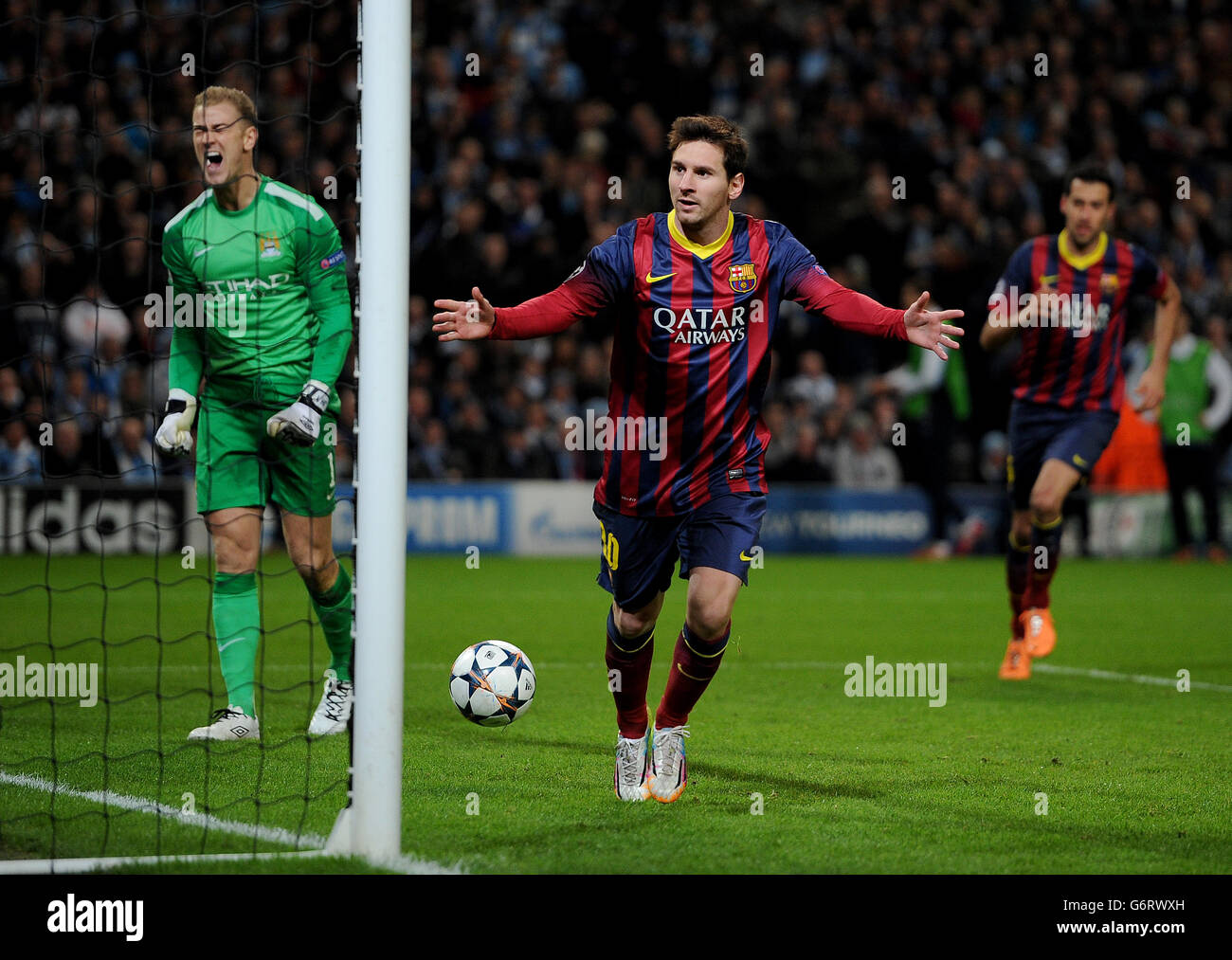 FC Barcelona's Lionel Messi celebrates scoring his teams 1st goal past ...