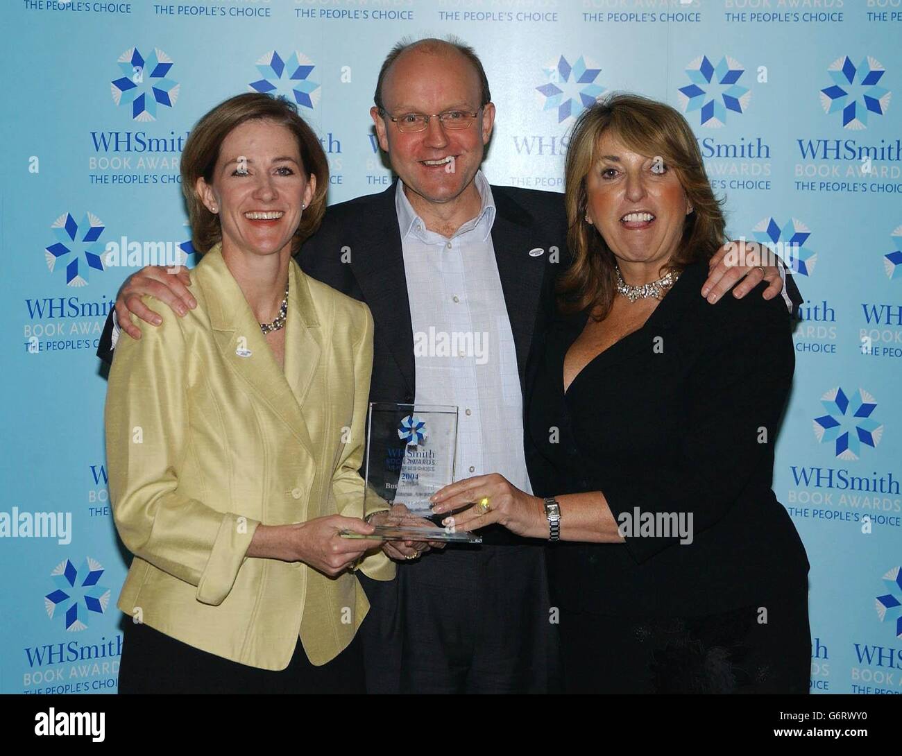 (From left to right) Barbara Cassani and Kenny Kemp receive the ...