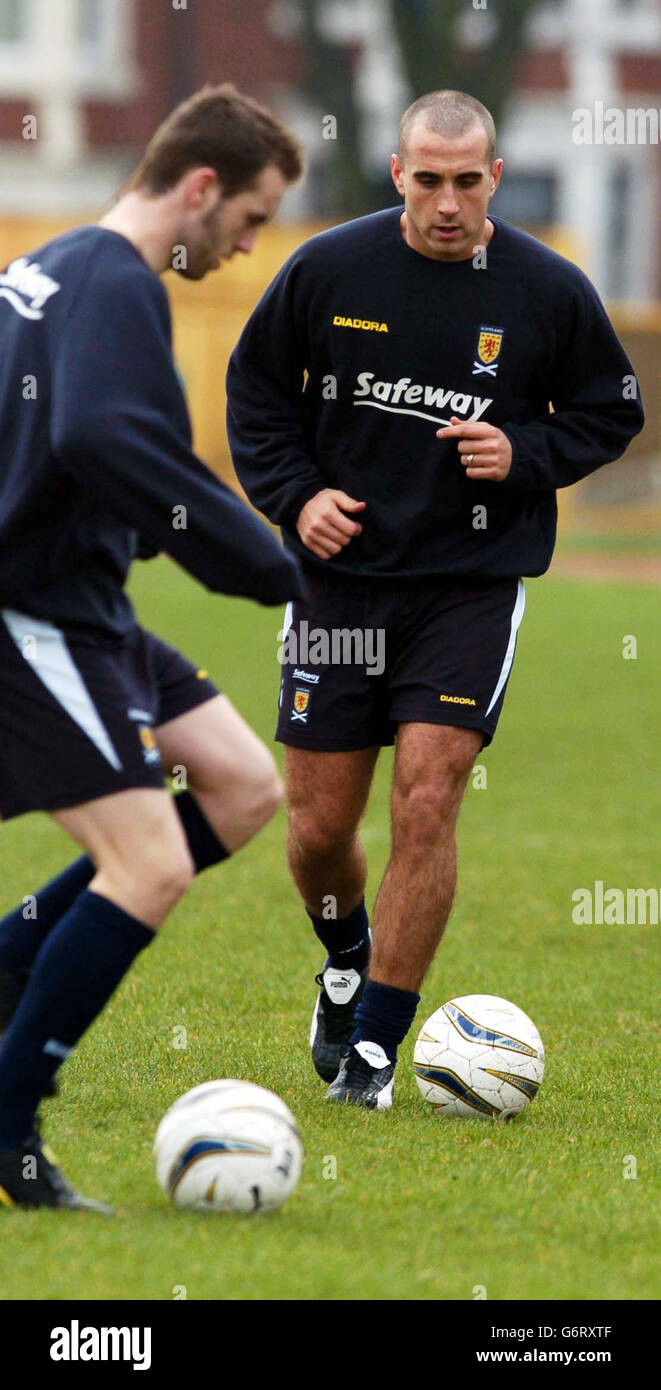 Walsall's Paul Ritchie (right) joins his Scotland team-mates during a ...