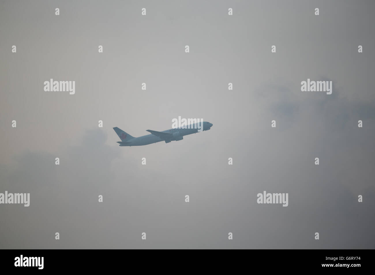 Planes take off in light fog at Heathrow Airport in London Stock Photo ...
